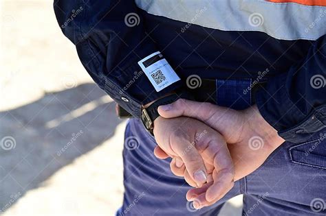 Individual Uniform Resource Identifier Uri Qr Code On A Blue Collar Worker Uniform Stock Image