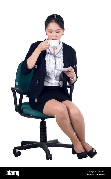 Business Woman Sitting In Office Chair With A Cup Of Coffee Isolated
