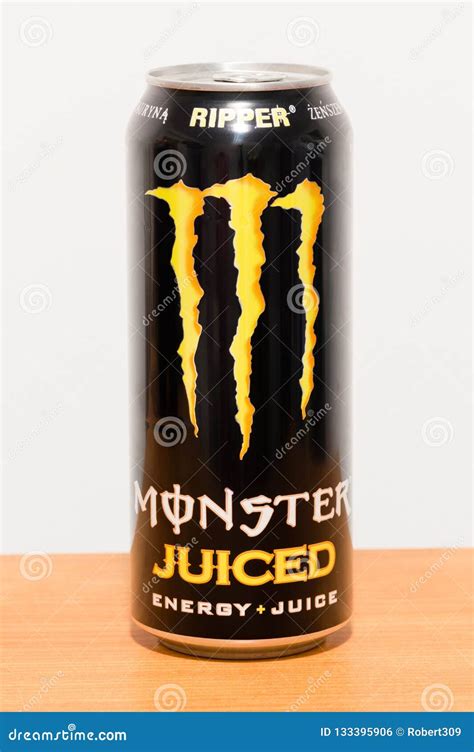 Monster Juiced Ripper Energy Drink on Wooden Table Editorial Photo ...