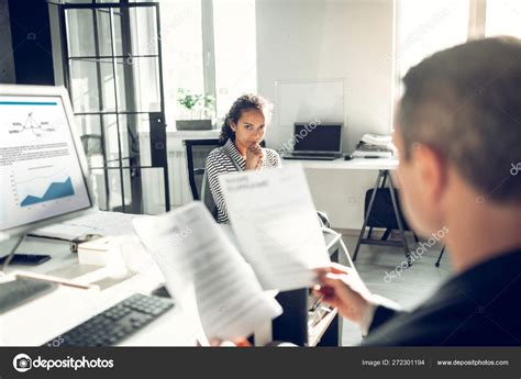 Curly Dark Haired Secretary Feeling Worried Having Job Interview Stock