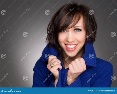 Smiling Man Wearing Fur Hooded Parka Coat In The Winter Park Stock