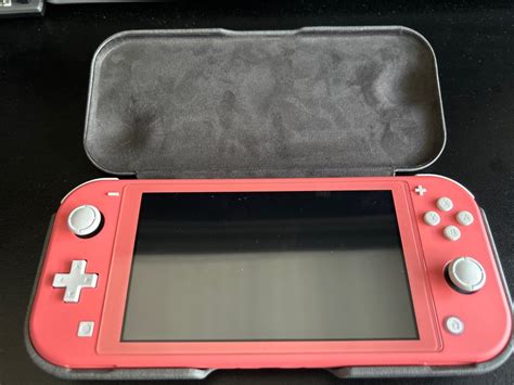 Nintendo Switch Lite Coral Video Gaming Video Game Consoles