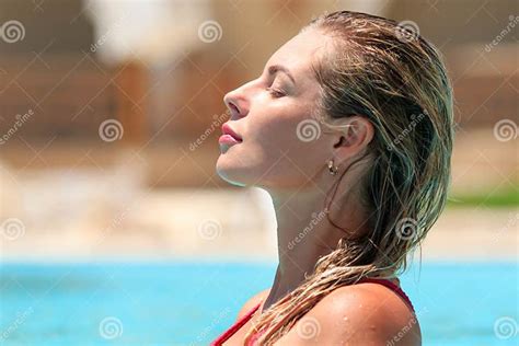 Beautiful Blond Wet Hair Girl With Deep Blue Eyes Attractive Look Face