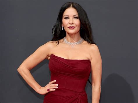 Catherine Zeta Jones Busts A Move In Chic Pantsless Look That Shows Off
