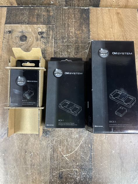 OM SYSTEM BCX 1 Lithium Ion Battery And Charger Kit Brand New Buya