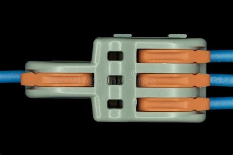 Compact Splicing Connector Isolated On Black Background Stock Image