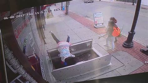 Texting Woman Seriously Injured In Fall Through Sidewalk Access Door