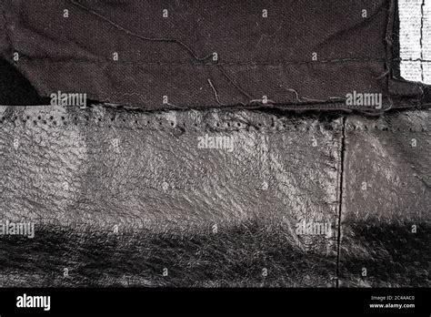 Crumpled Black Leather Texture Background Abstract Texture Of Messy Leather With A Seam Back