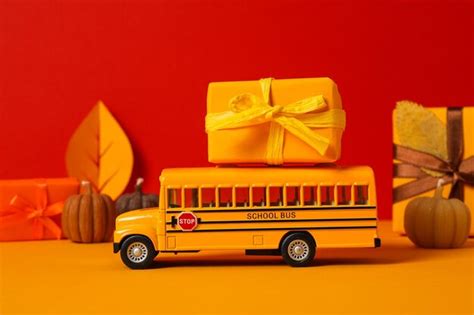 Premium Photo Fall Semester Season Concept With Babe Bus And Fall Accessories