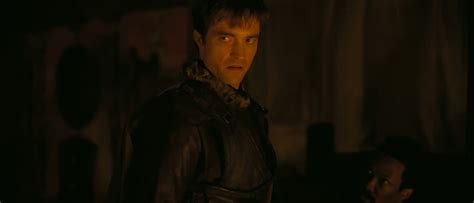 The Odyssey Trailer Unveils Villainous Robert Pattinson Charlize