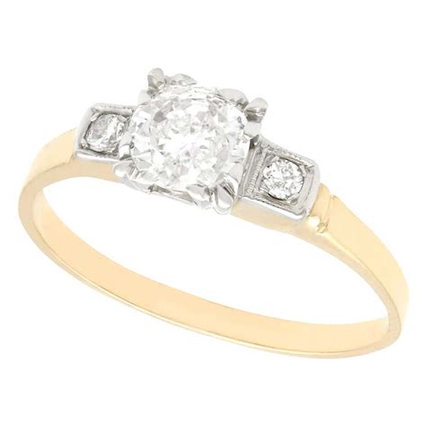 Vintage Oval Cut Diamond And Yellow Gold Cluster Engagement Ring For