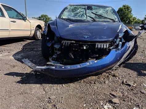 Tesla Model 3 Totaled In Roll Over Crash Autoevolution