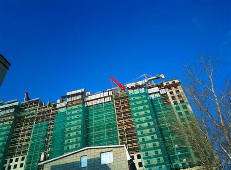 Premium Photo City Building Construction In Daylight Background