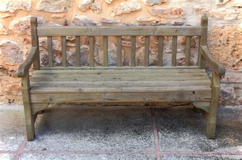 Premium Photo Old Wooden Bench Near Stone Wall