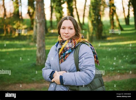 Outdoor Portrait Of 40 45 Year Old Woman Wearing Warm Jacket And