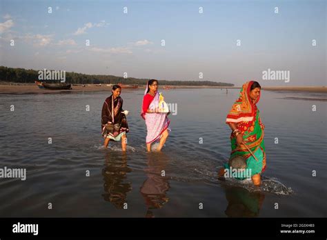 Devotees Sailing Model Boats In The Sea On The Occasion Of Boitha