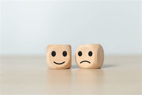 Face Emotion Positive And Negative Concept Wooden Cube With Smiley