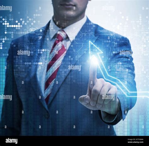 The Businessman Pressing Virtual Button On Diagram Chart Stock Photo
