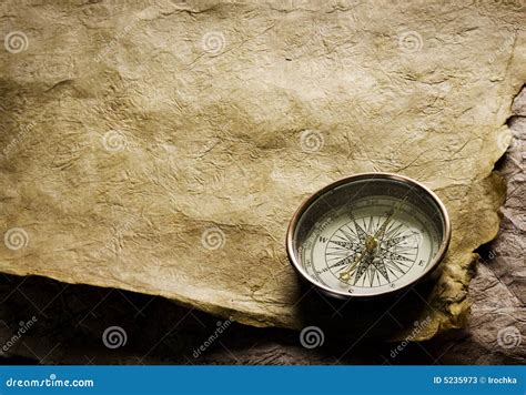 Old Compass And Paper Stock Image Image Of Yellow Tool 5235973