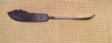 Wm Rogers And Son Aa Twisted Butter Knife Aol 82 Antique Price Guide Details Page