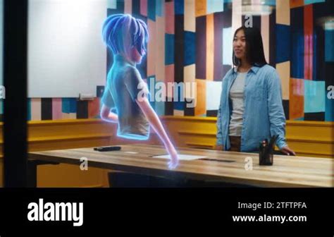 An Avatar Of A Girl Gives Presentation To An Asian Woman Through An