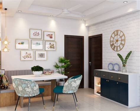 Compact Dining Room Design With Floral Blue Chairs Livspace