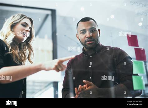 Winning Takes Planning A Young Businessman And Businesswoman