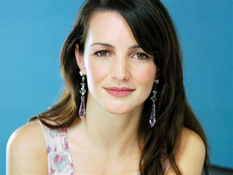Download Elegant Kristin Davis Posing In Stylish Red Dress Wallpaper