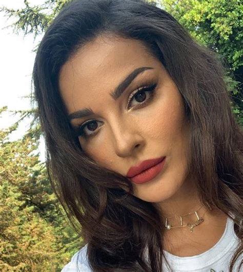 نادين نسيب نجيب بصورة عفوية مع طفليها هكذا تبدو بدون مكياج Laha