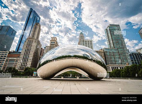 Cloud Gate Aka The Bean Reflects Chicagos Skyline In Millennium
