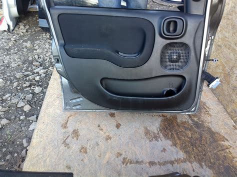 TAPICERKA BOCZEK DRZWI PRAWY Lewy Fiat Panda III 3 7813954122