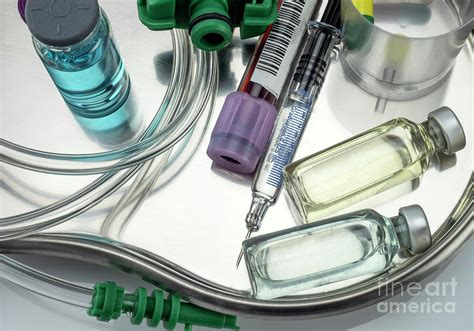 Phials And Syringes By Science Photo Library