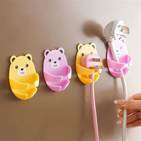 New Wall Storage Hook Bear Plug Bracket Punch Free Power Plug Socket Holder Kitchen Cable Hook