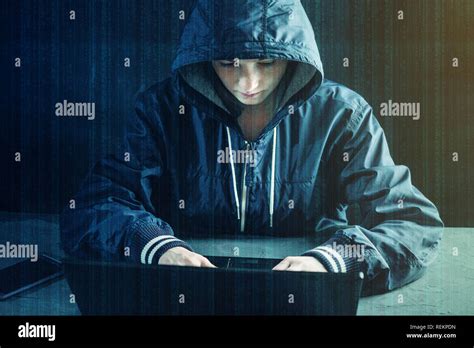 Hacker Teen Programmer Uses A Laptop To Hack The System Stealing