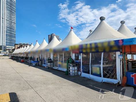 [르포]손님 대신 적막만… 불친절 논란 오징어난전의 막바지 성수기