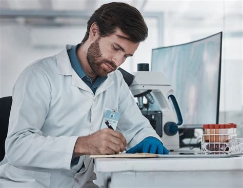 Premium Photo Science Man And Writing Notes In Laboratory For