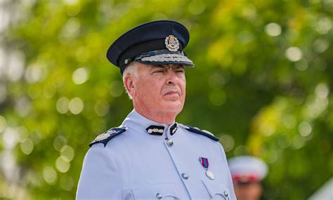 Police Commissioner Byrne Signing Off Cayman Compass