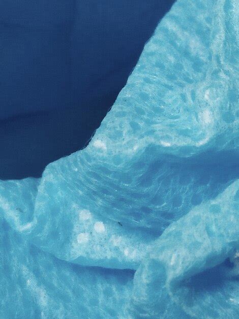 Premium Photo Close Up Of Shiny Blue Fabric