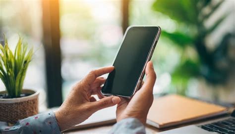 Hand Using A Phone At Home Capturing The Essence Of Modern Connectivity And Digital Lifestyle