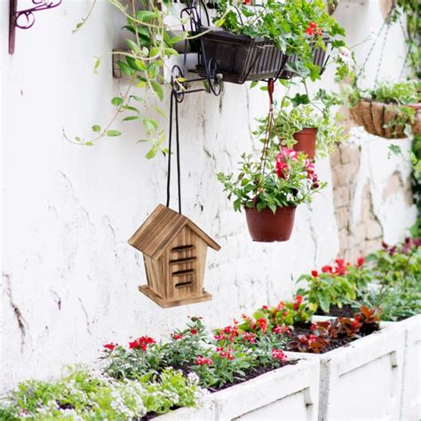 Comprar 2 casas para mariquitas de madera flameada AQUÍ