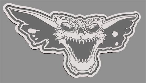 Stl File Gremlin Skull Melting Badge 💀・3d Printing Template To Download