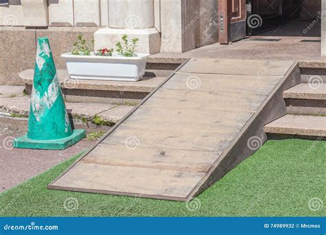 Wooden Ramped Access Using Wheelchair Ramp For Disabled People