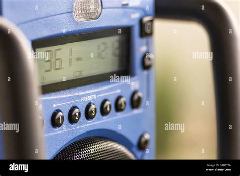 Close Up Of A Blue Portable Radio Tuning Display Showing Fm Radio Frequency Presets And