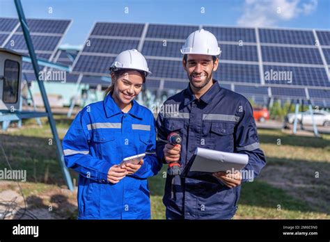 Maintenance Engineer At Solar Farm Hold Drill Machine And Checklist
