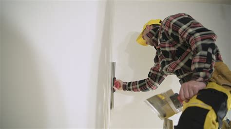 Construction Worker Patching Apartment Walls 24669732 Stock Video At