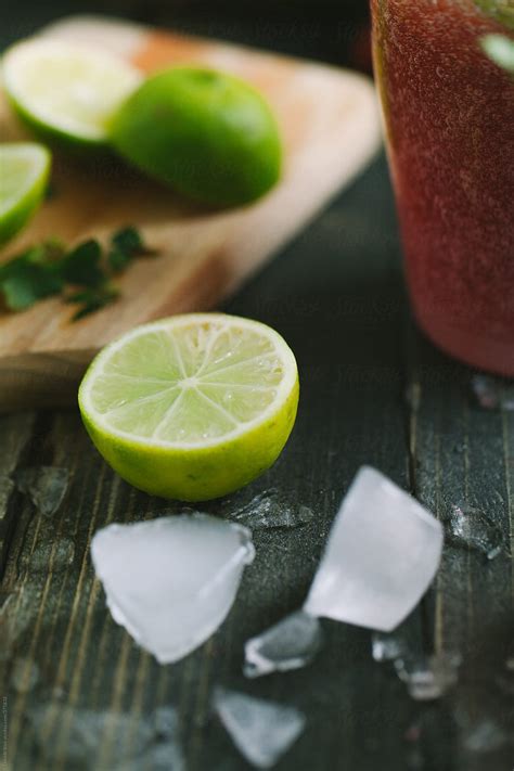 Lime Used To Prepare A Cocktail By Stocksy Contributor Davide Illini