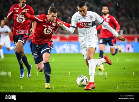 Gabriel GUDMUNDSSON Of Lille And Kylian MBAPPE Of PSG During The French