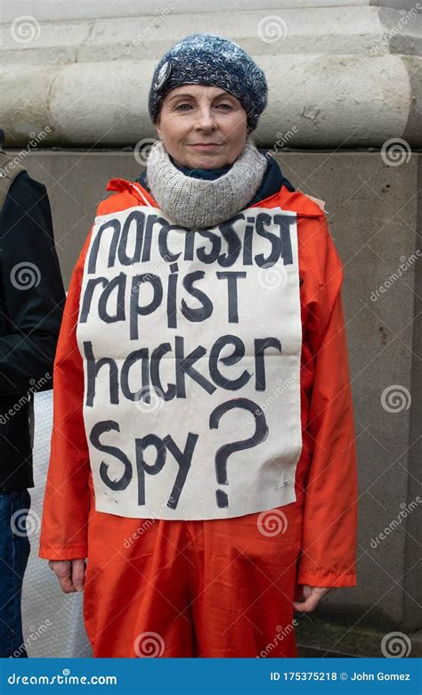 Protester Against Julian Assange`s Extradition To The Usa Editorial