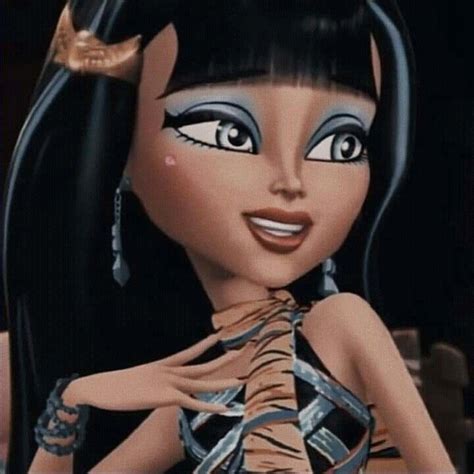 An Animated Doll With Black Hair And Blue Eyes