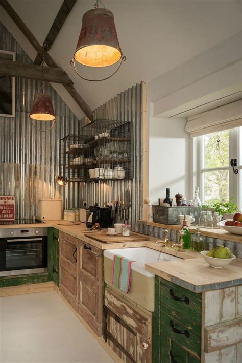 Rustic Farmhouse Kitchen With Green Cabinets And White Countertops